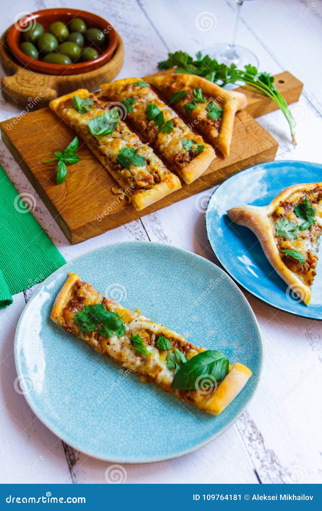 Traditional Turkish Pizza Pide on a Plate and on a Blackboard Stock ...