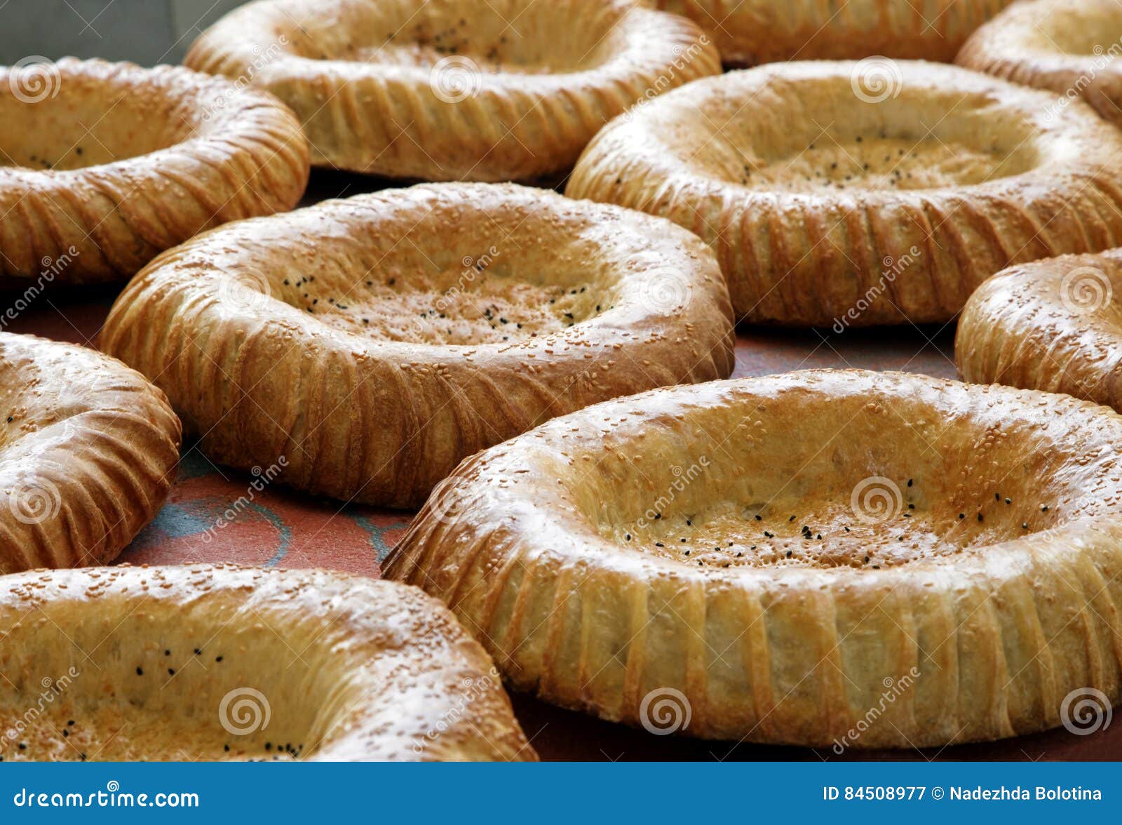 Traditional uzbek bread stock image. Image of dough, breakfast - 84508977