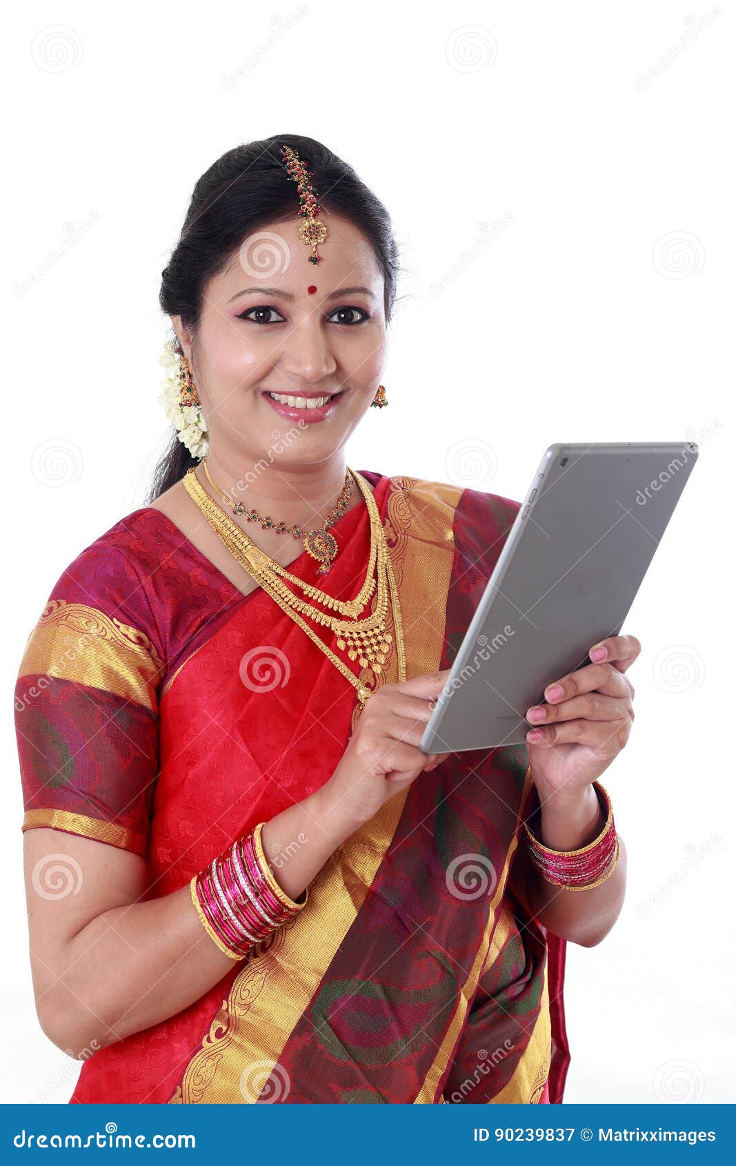Traditional Woman Holding Tablet Computer Against White Stock Image ...