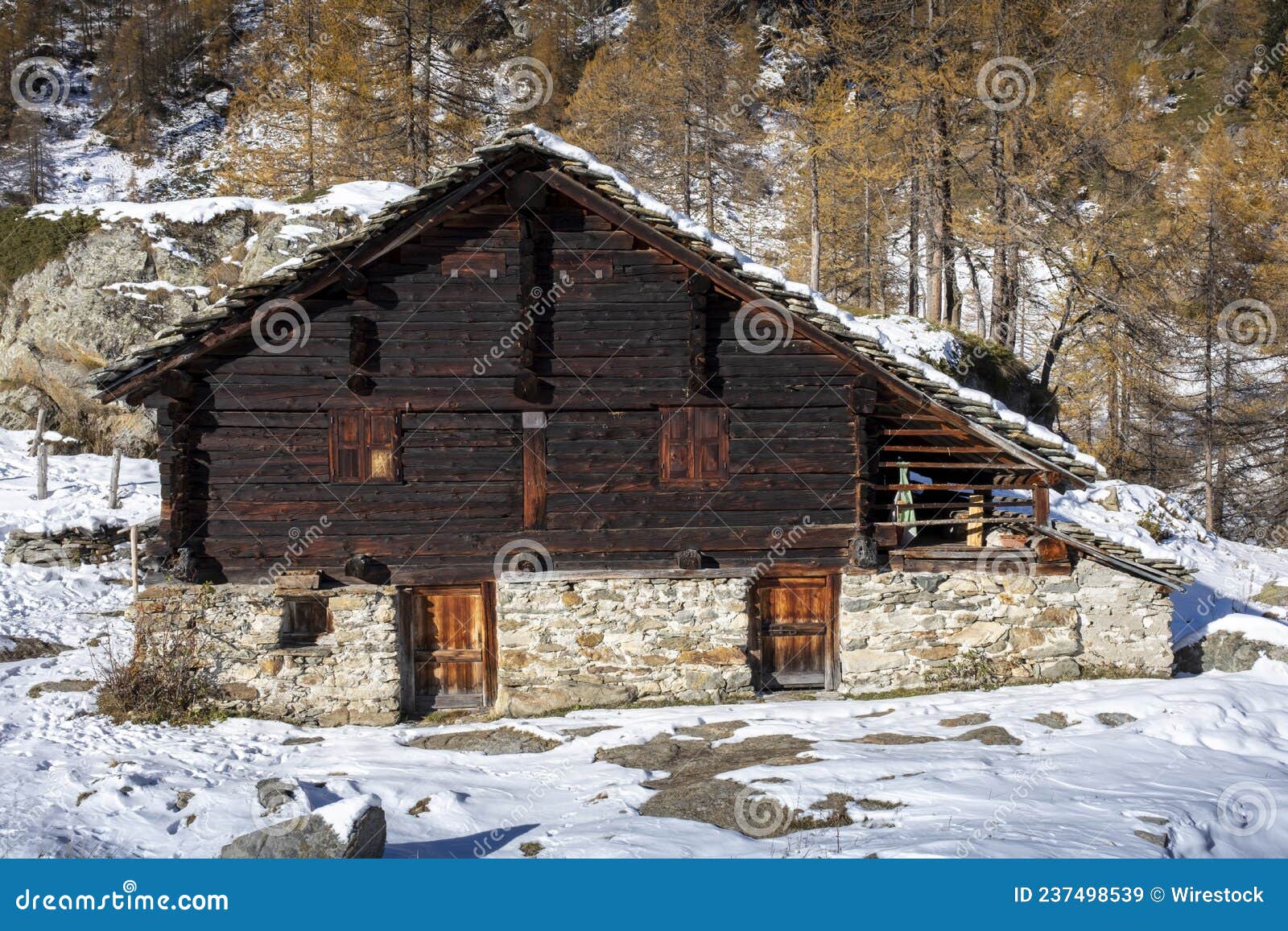 Wooden house in the Alps stock image. Image of nature - 237498539