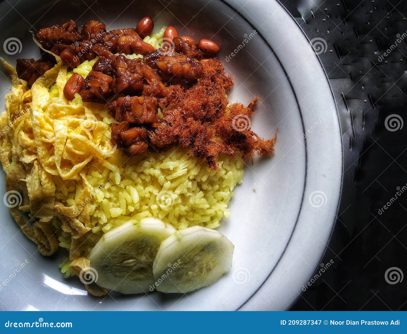 Traditional Yellow Rice Menu for a Simple Birthday Celebration Stock ...
