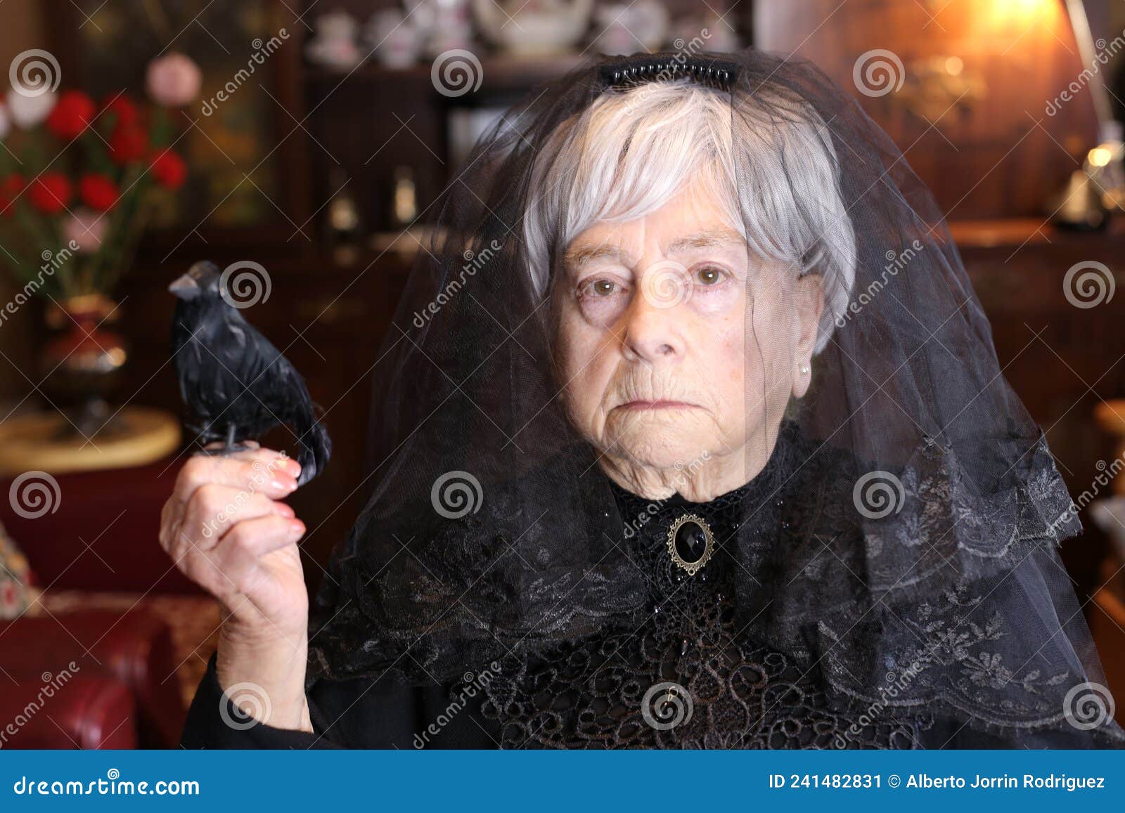 Traditionally Dressed Senior Widow with Sad Expression Stock Image ...