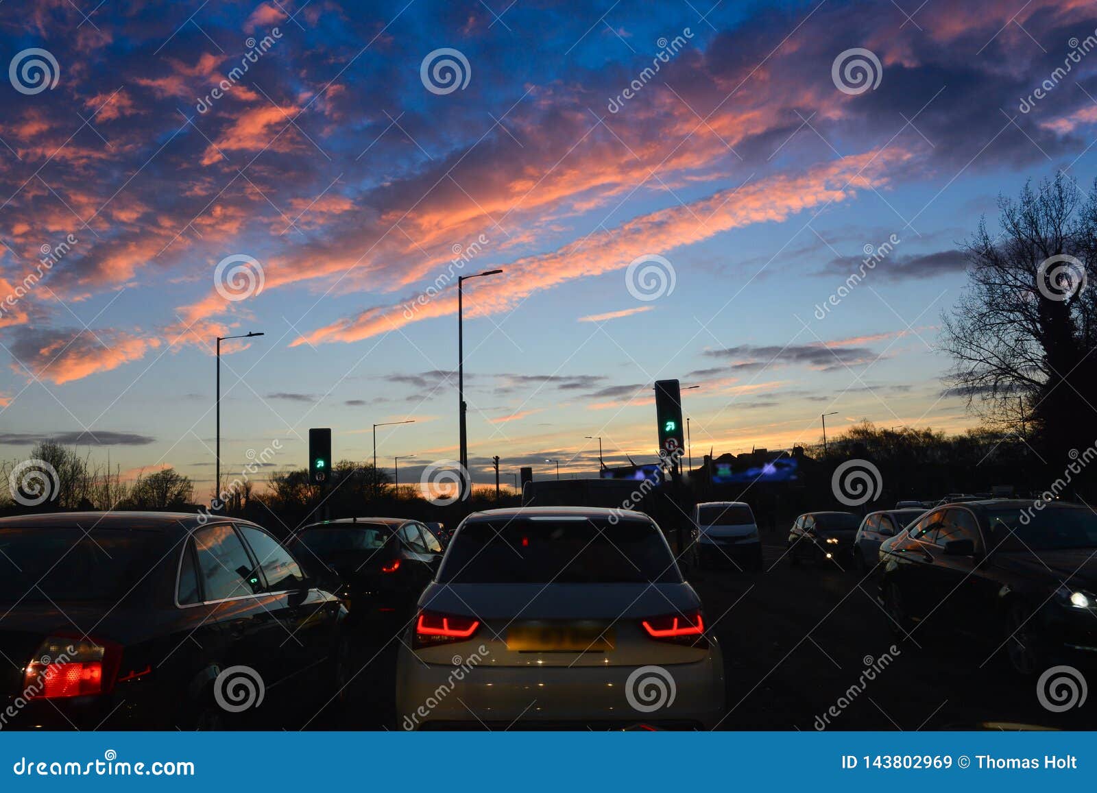 Traffic at a Busy Road Junction at Night Stock Image - Image of evening ...