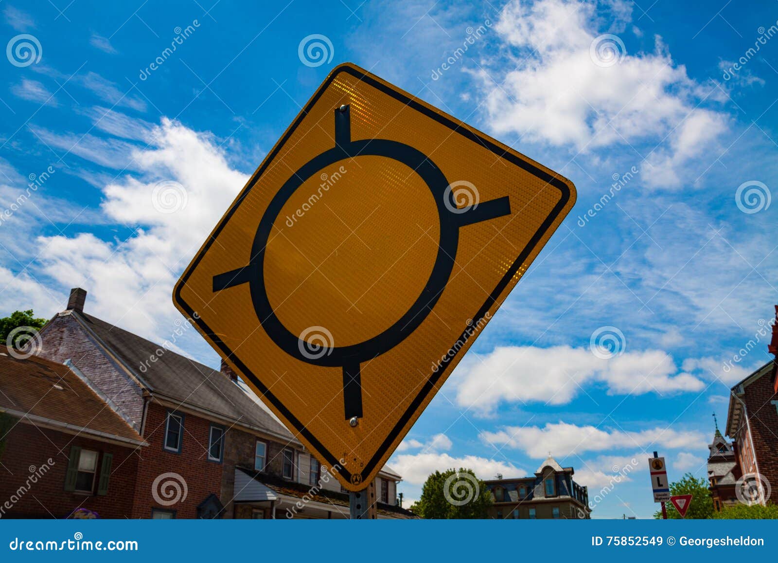 Traffic Circle Ahead Sign stock image. Image of precaution - 75852549