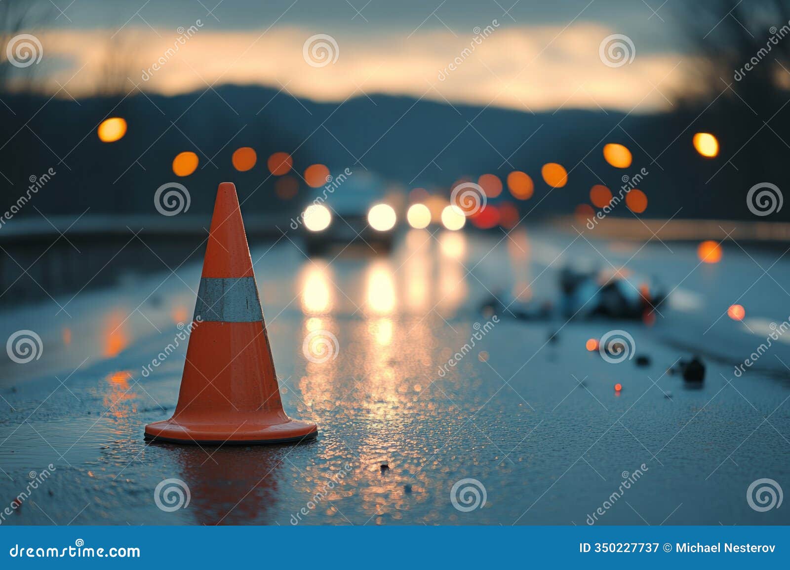 Traffic Cone Warning of Car Crash on Wet Road at Twilight Stock Image ...