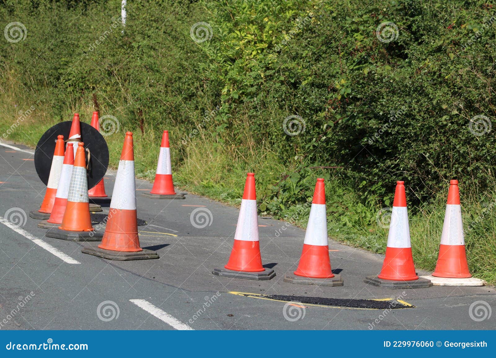 Traffic Cones Around Subsidence at Road Works Stock Photo - Image of ...
