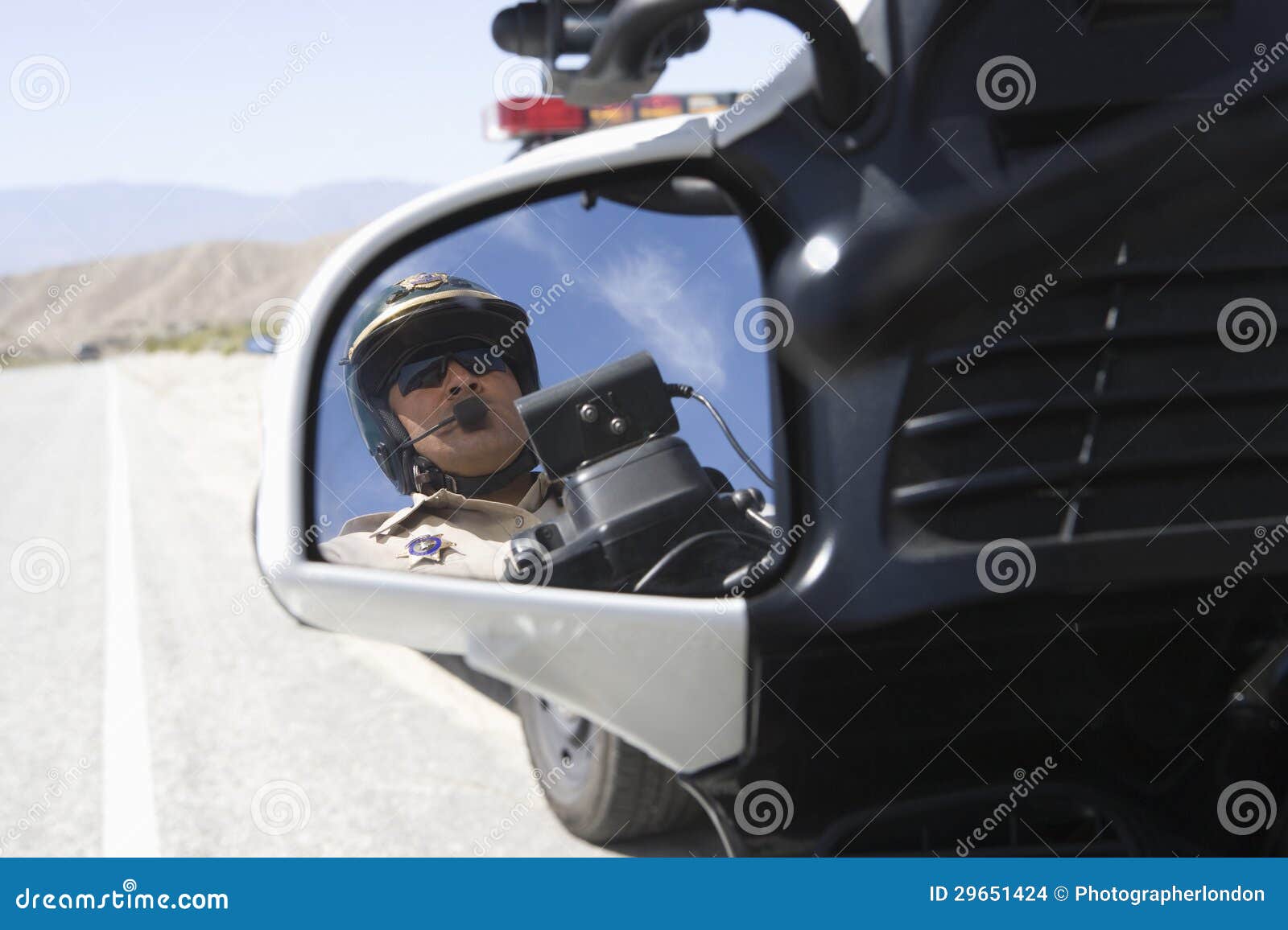 Traffic Cop Reflecting in Side View Mirror Stock Photo - Image of ...