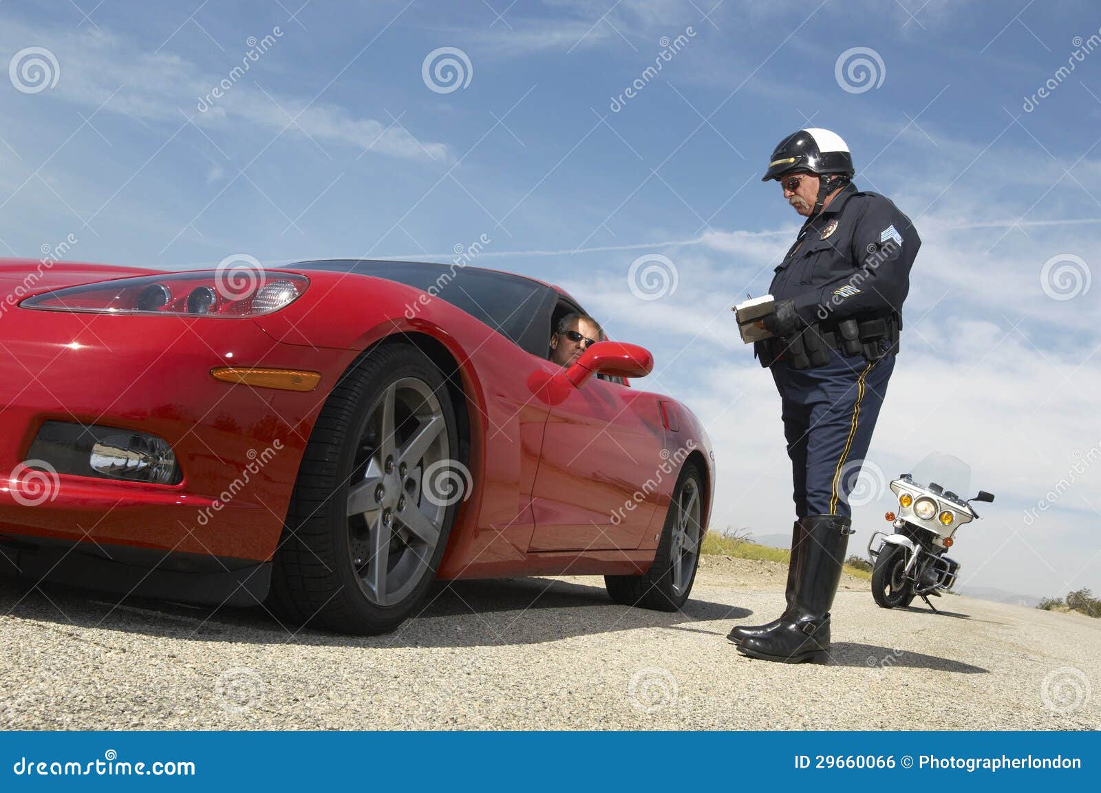 Traffic Cop Talking with Driver of Sports Car Stock Photo - Image of ...