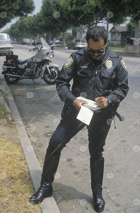 Traffic Cop Writing Ticket, Editorial Photography - Image of males ...