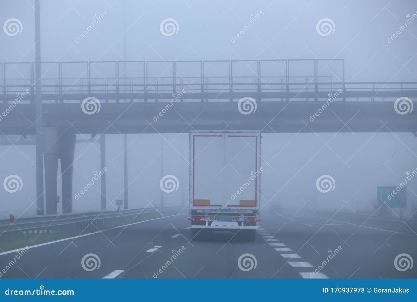 Traffic during fog stock photo. Image of season, dashed - 170937978