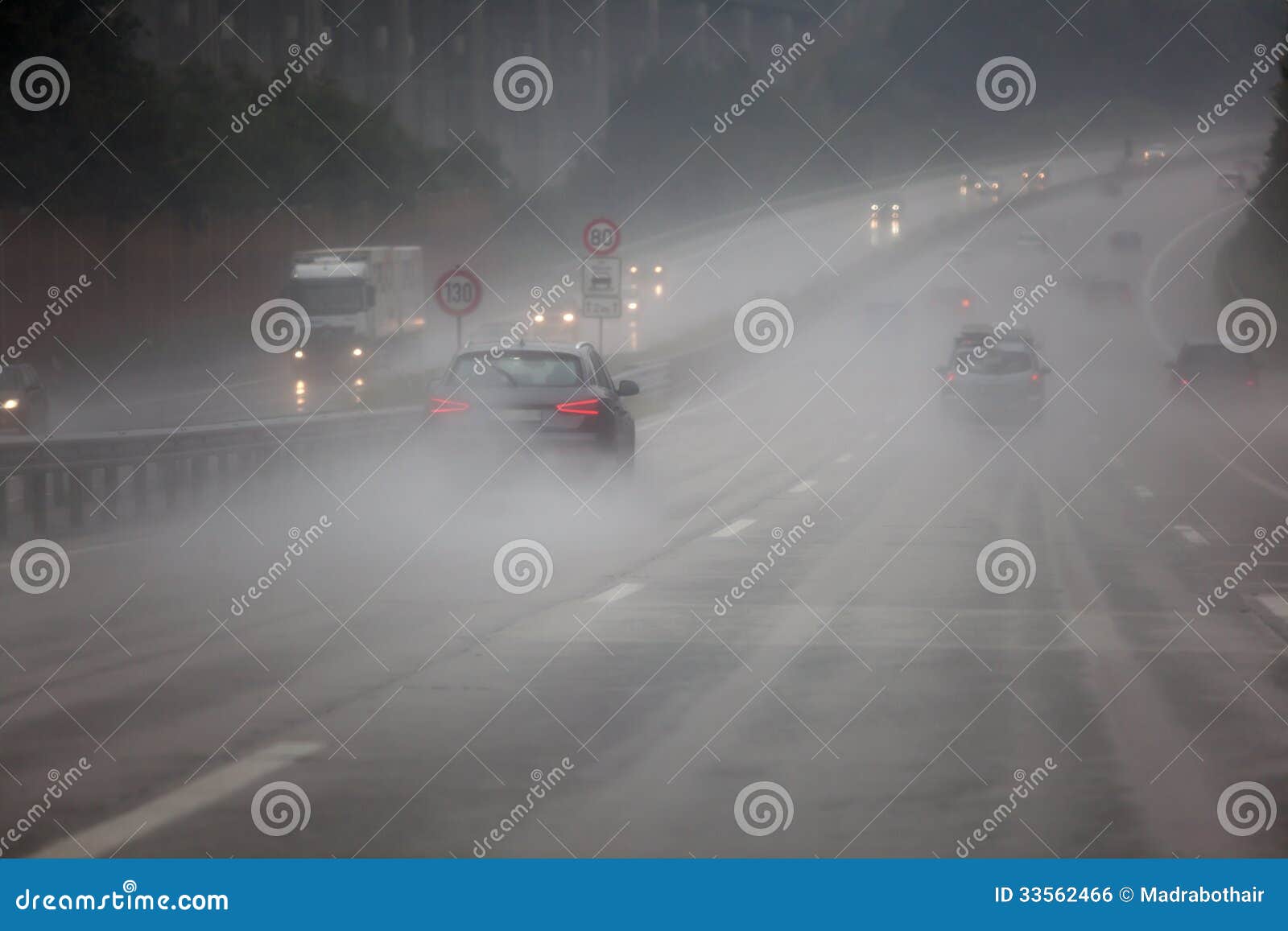 Traffic at heavy rain stock photo. Image of barrier, rainy - 33562466