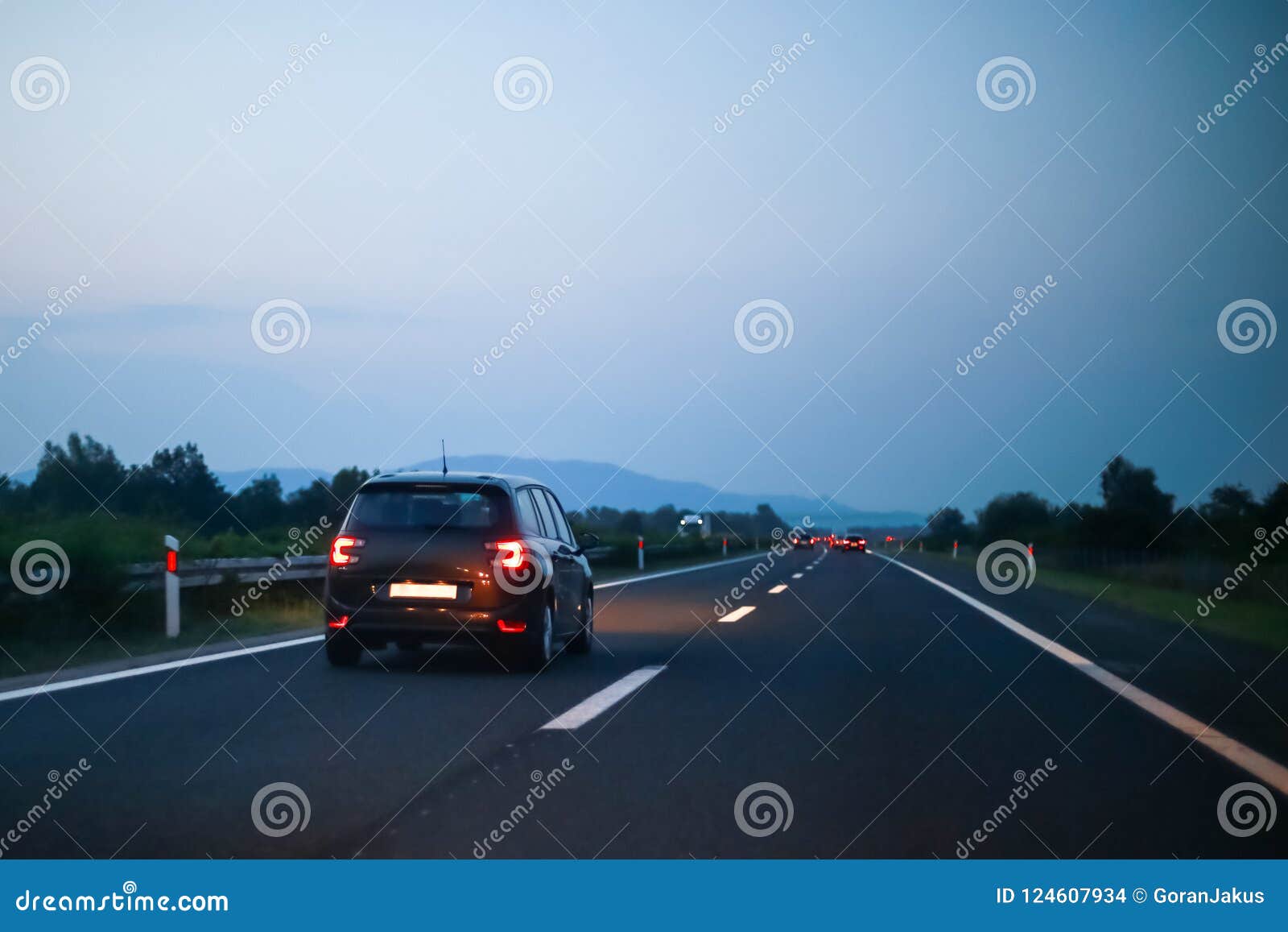 Traffic on the Highway at Sunset Stock Photo - Image of automobile ...