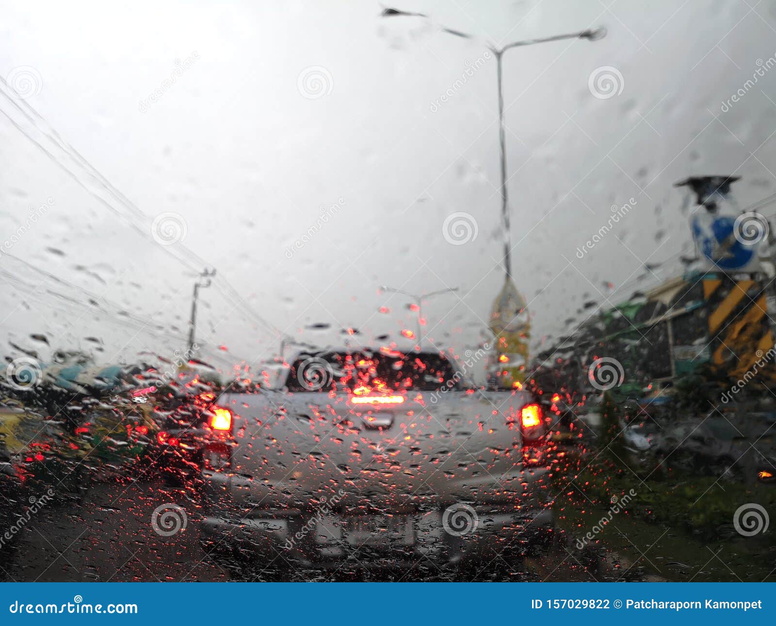 Traffic Jam in a Rainy Day. Rain Drops on Mirror Surface Stock Photo - Image of rainy, street ...
