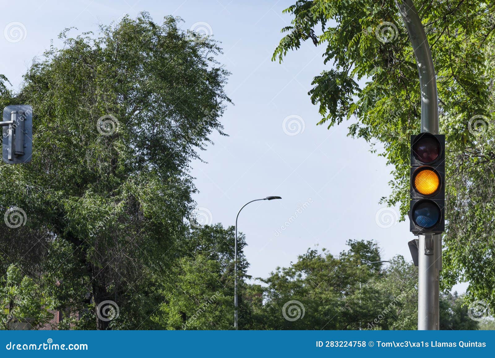 A Traffic Light with Amber Light on a Street Stock Photo - Image of ...