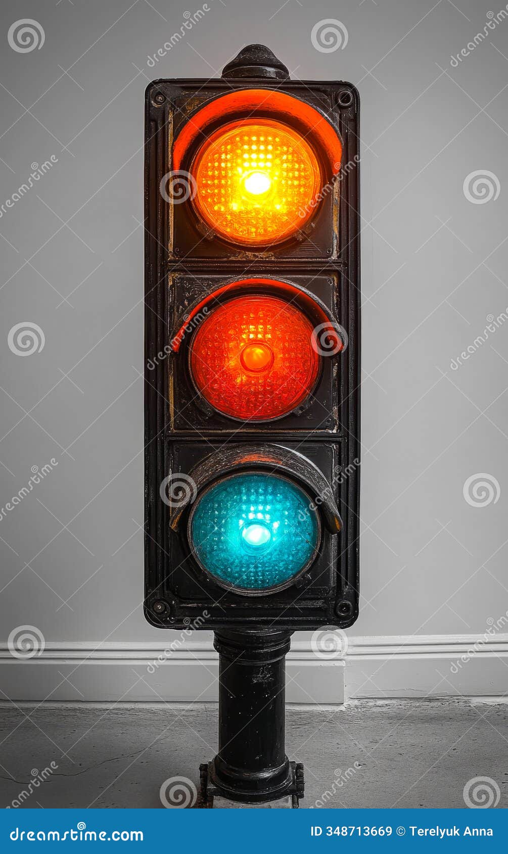 A Traffic Light with a Green Light and Two Red Lights Stock Image ...