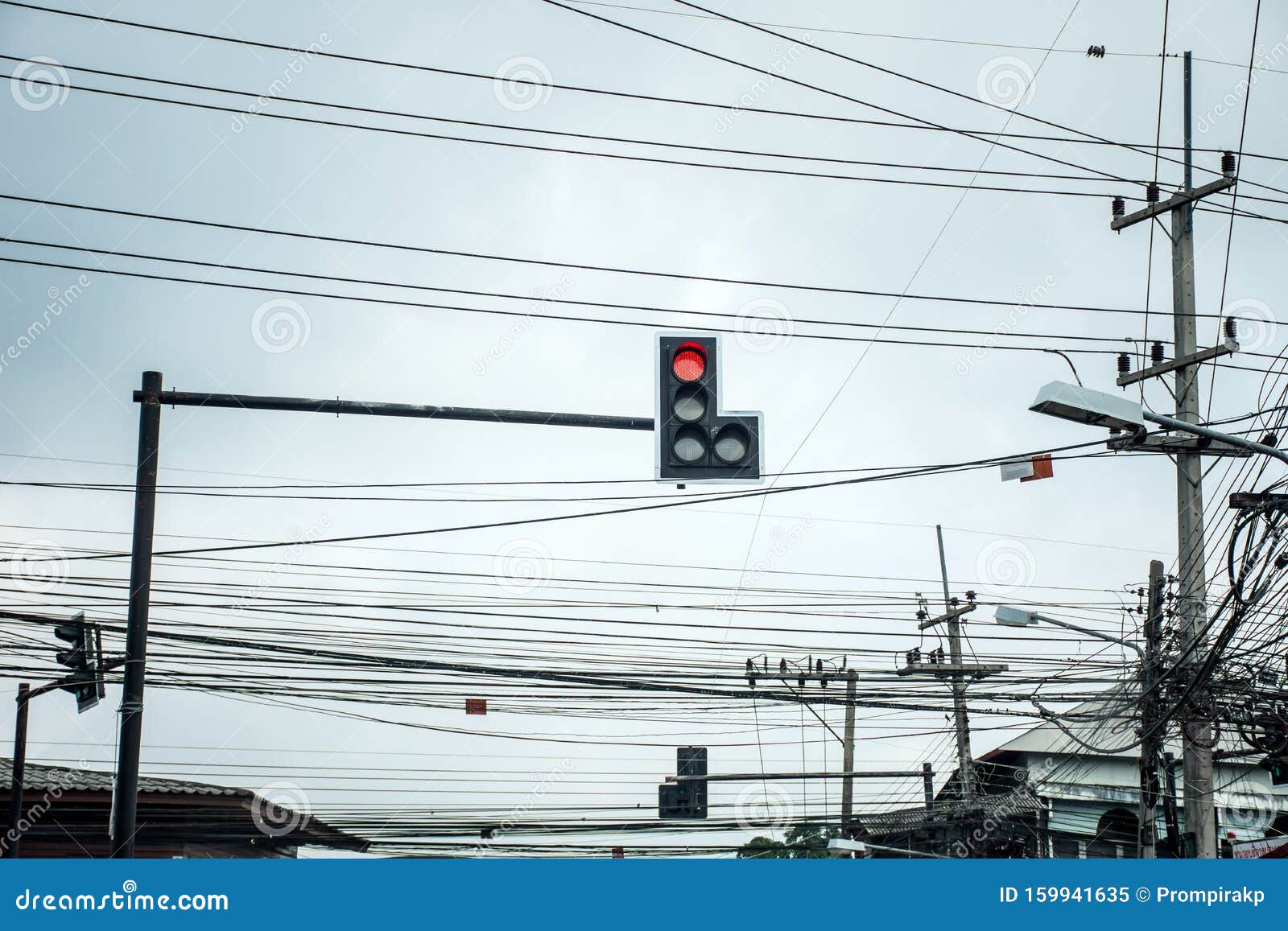 Traffic Light at Intersection Roads Showing Red Light with Tangle of ...