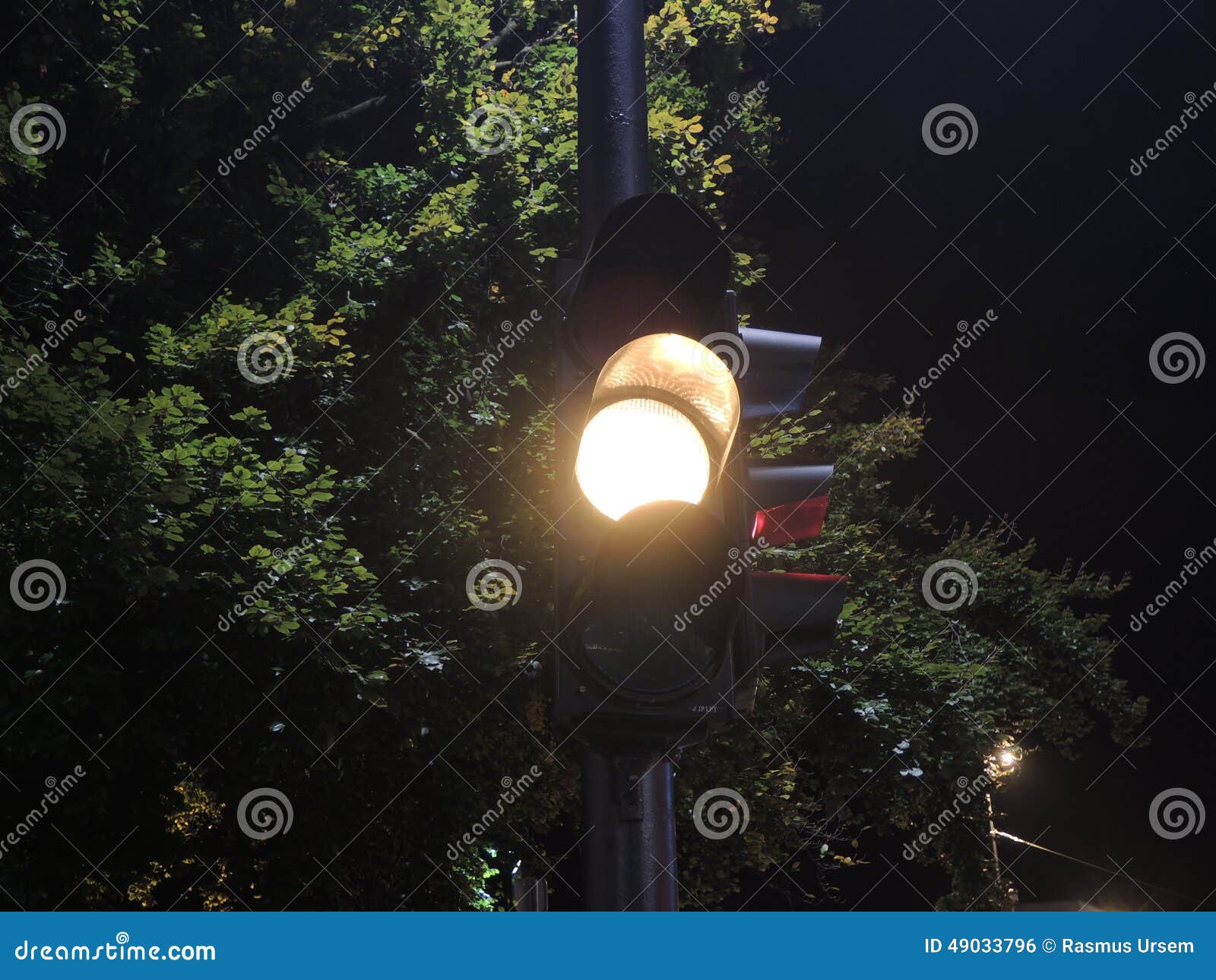 Traffic Light at Night-time Showing Yellow Stock Photo - Image of light ...