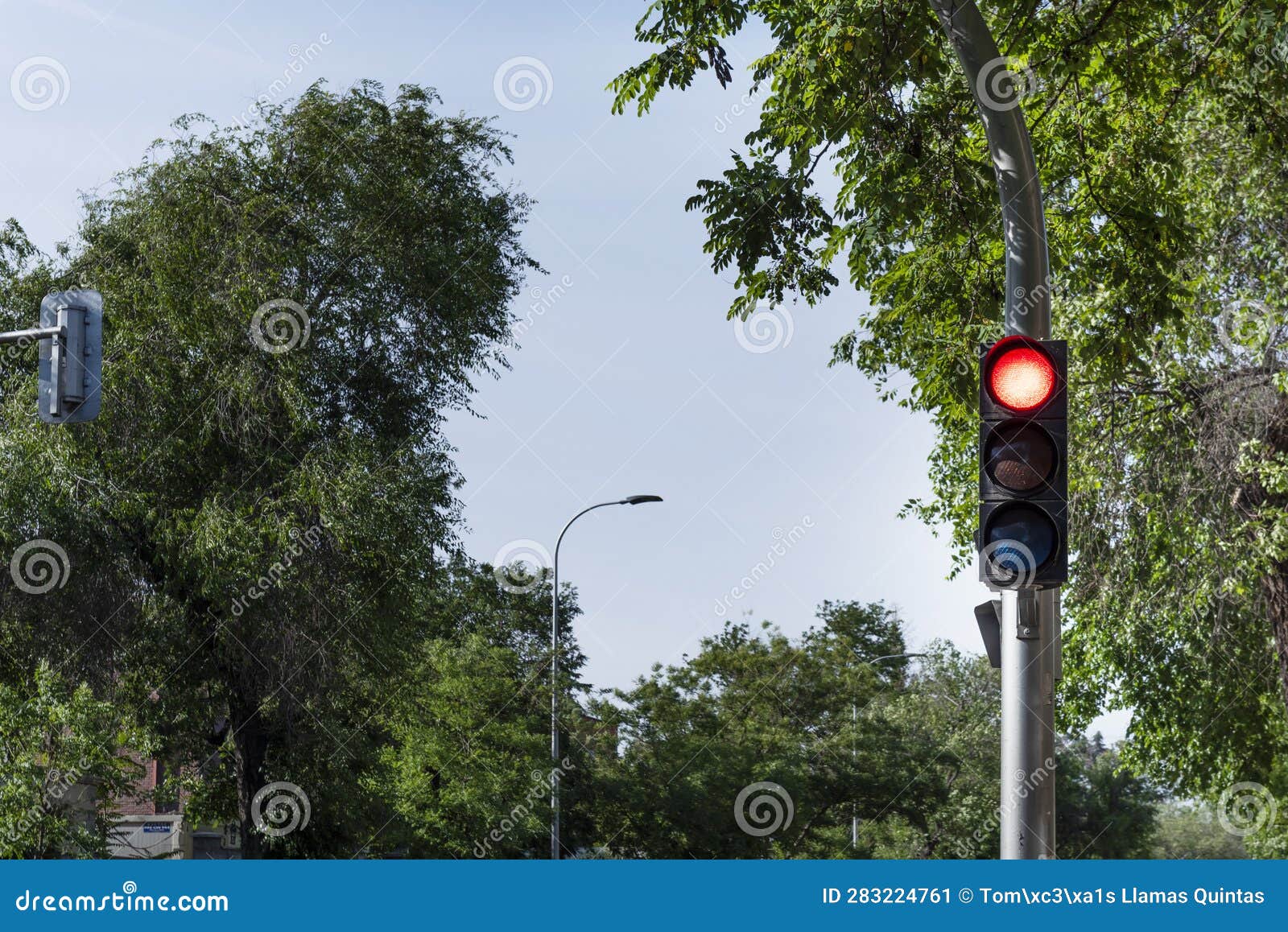 A Traffic Light with Red Light on a Street Stock Image - Image of river ...
