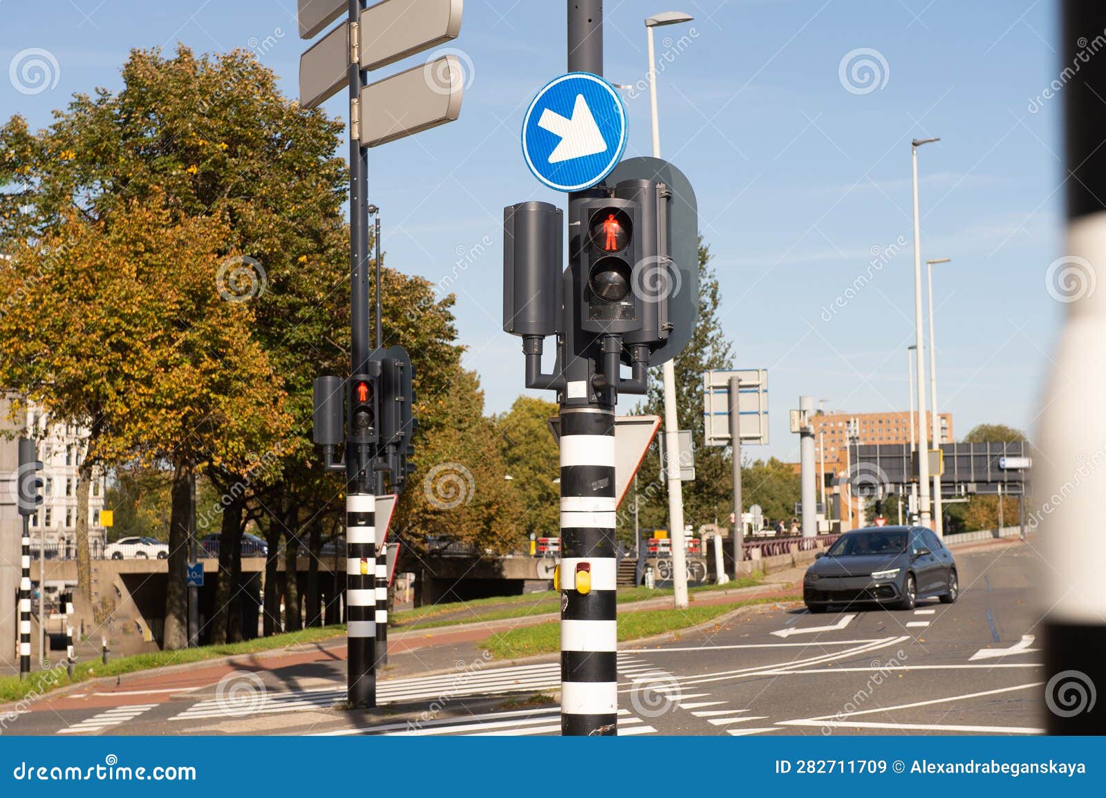 Traffic Light-regulated Intersection with Road Signs. Red Traffic Light ...