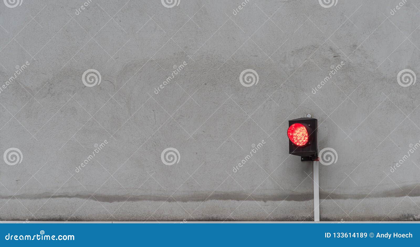 The Traffic Light Shows Red on the Gray Facade Stock Image - Image of ...