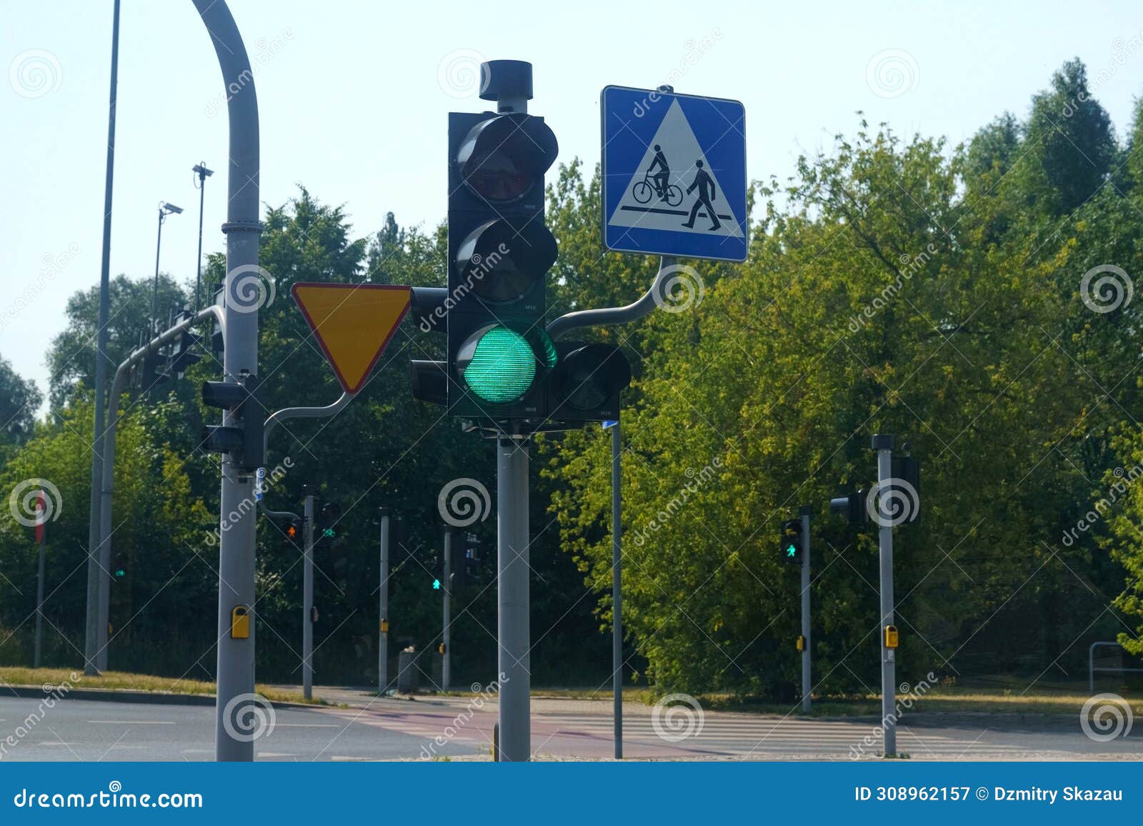 The Traffic Light on the Side of the Road Has a Green Light. Stock ...