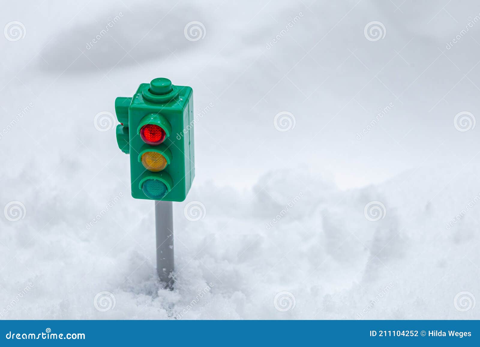 Traffic light in the snow stock photo. Image of environment - 211104252