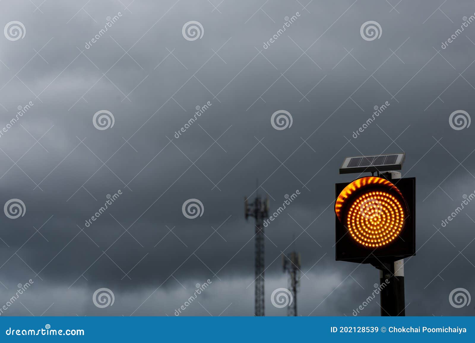 Traffic Light with Solar Cell Panel on the Top Against Stormy Cloud ...