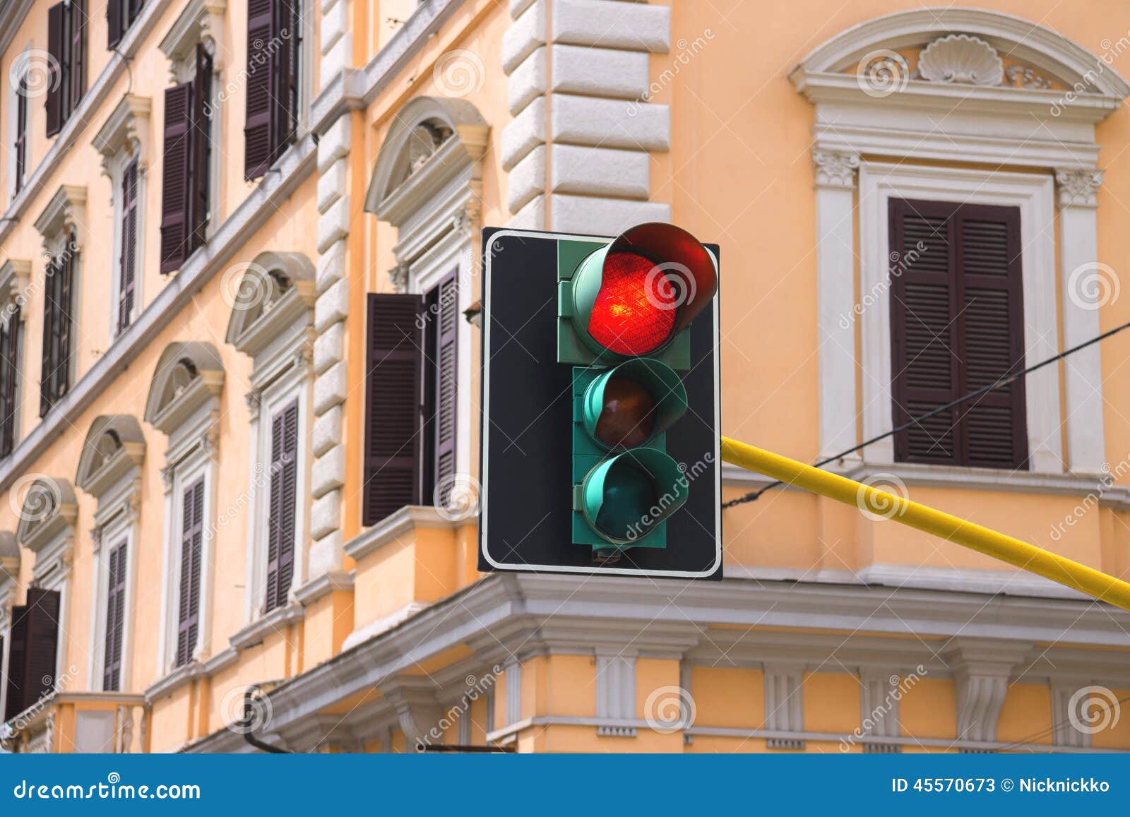 Traffic Lights at the Crossroads of the City is Lit Red Stock Image ...