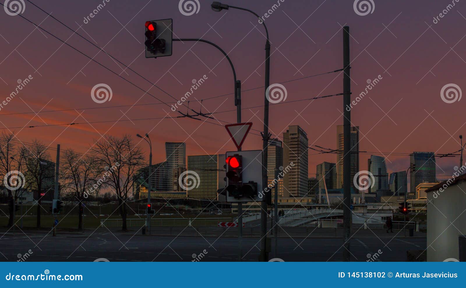 Traffic lights in sunset stock photo. Image of building - 145138102