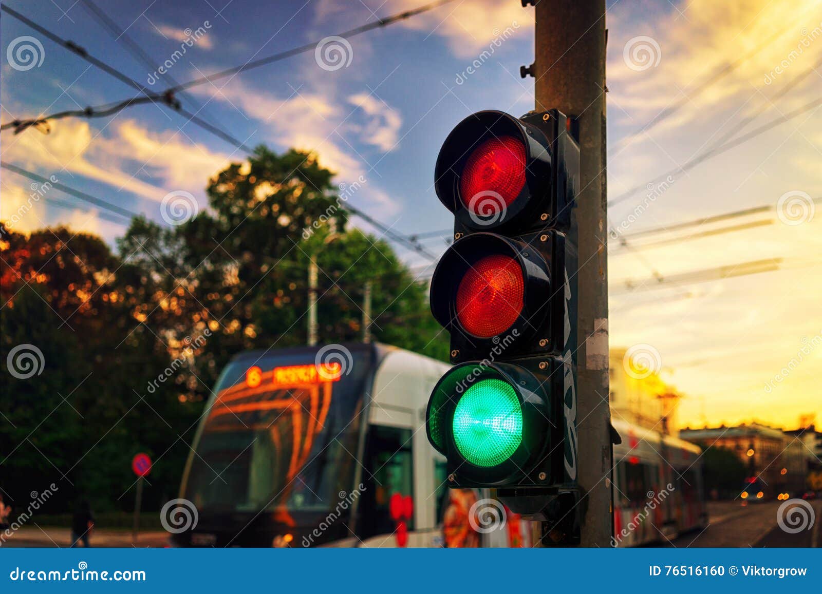 Traffic Lights and a Tram in Counter Light Stock Photo - Image of night ...