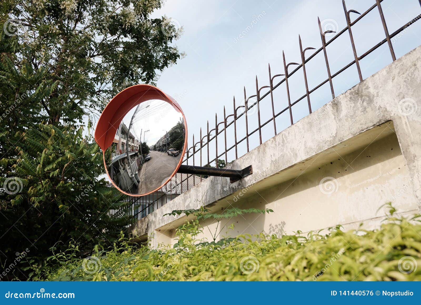 Traffic Mirror on the Wall at Intersection or Curve of Road Stock Photo ...