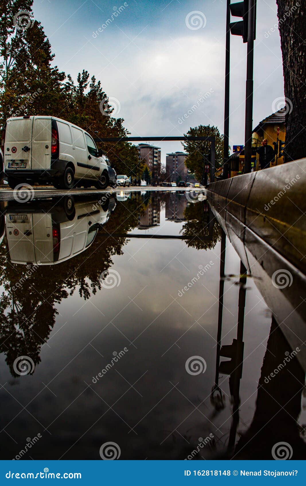 Traffic Reflection in Street Puddle of Water Editorial Stock Photo ...