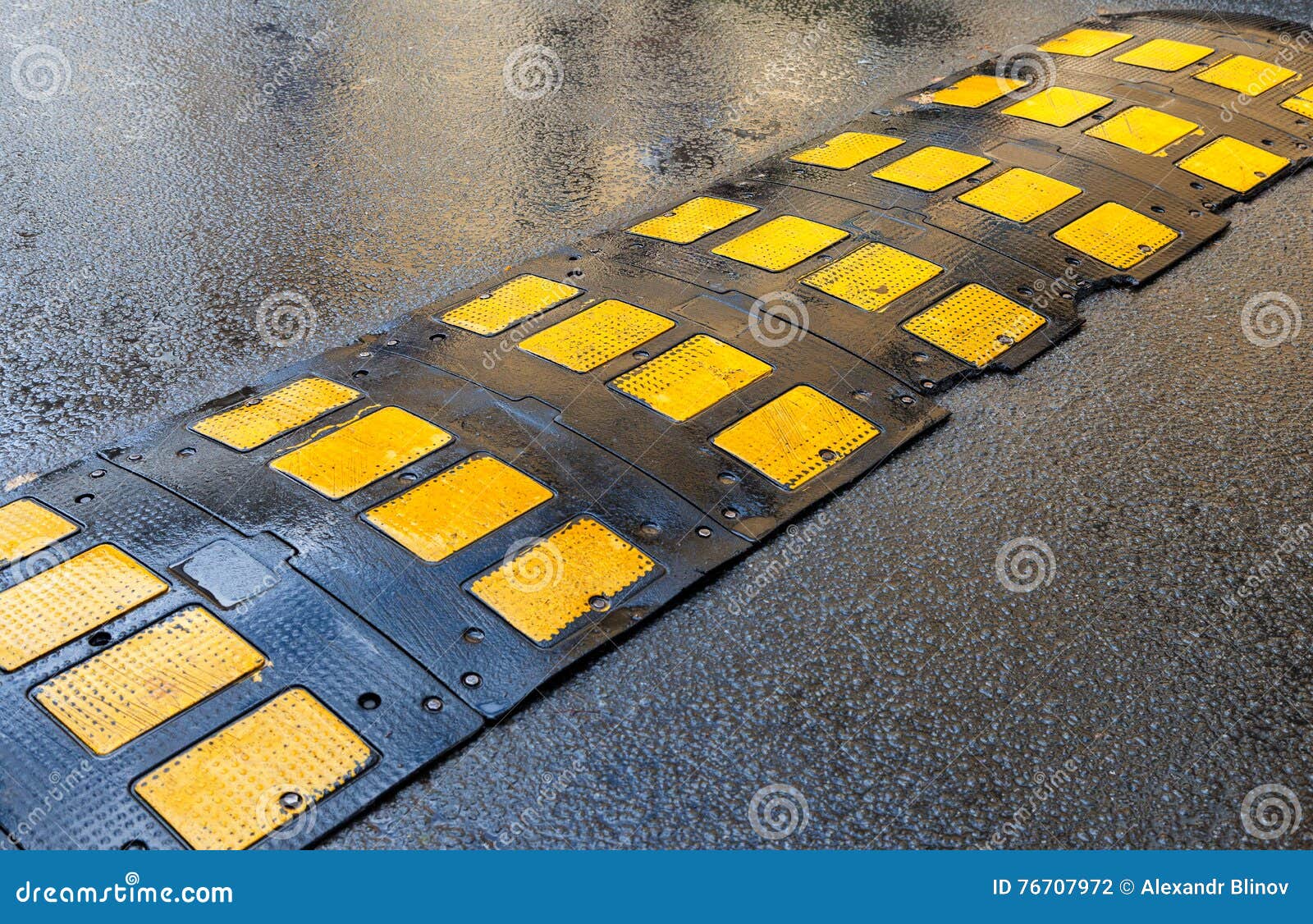 Traffic Safety Speed Bump on an Asphalt Stock Photo - Image of roadway ...