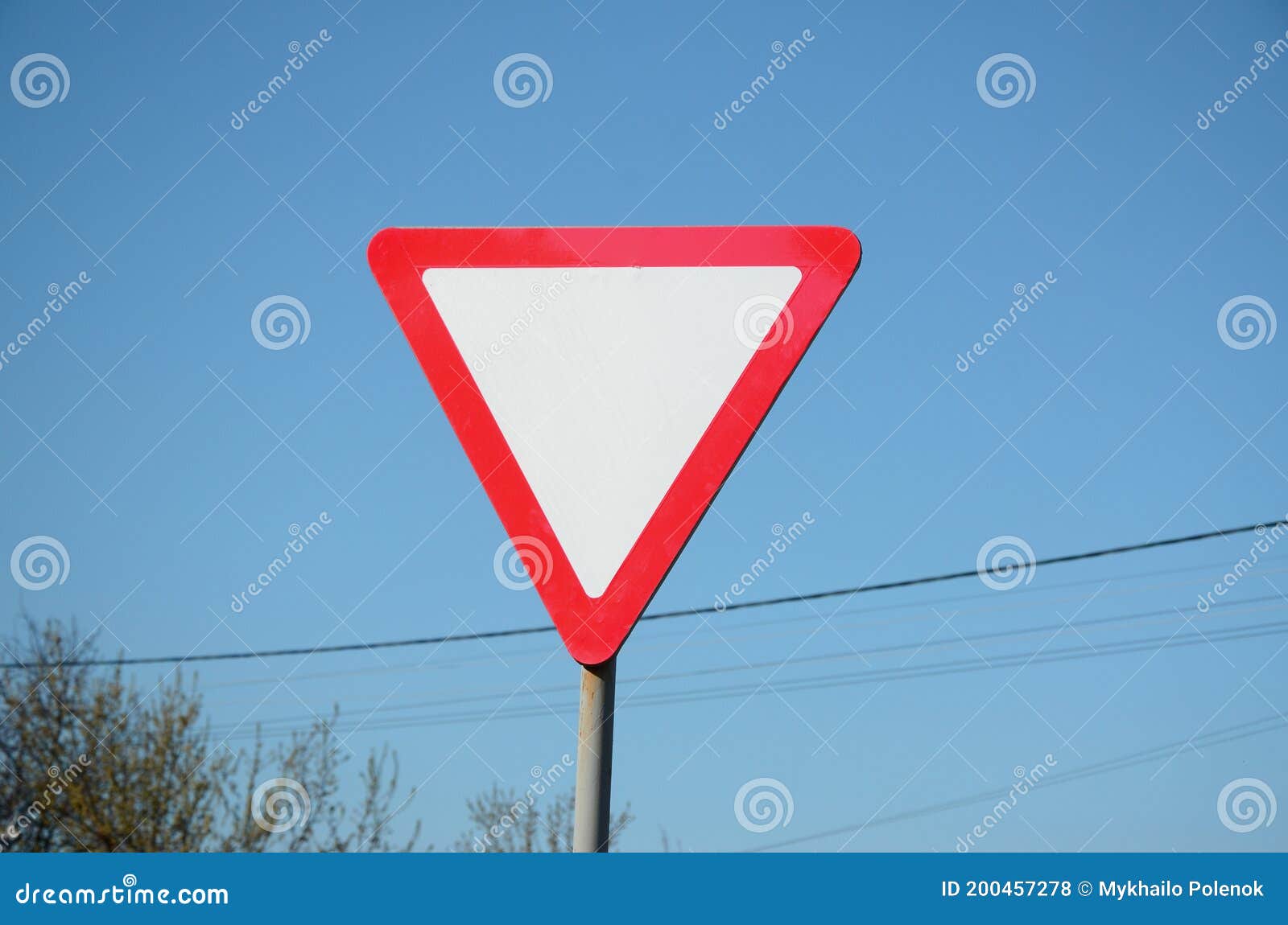 Traffic Sign in the Form of a White Triangle. Give Way Stock Photo ...