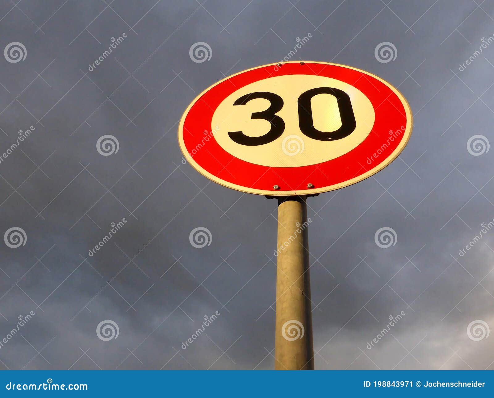 Traffic Sign in Germany at a Dark Sky with Speed Limit 30 Stock Image ...