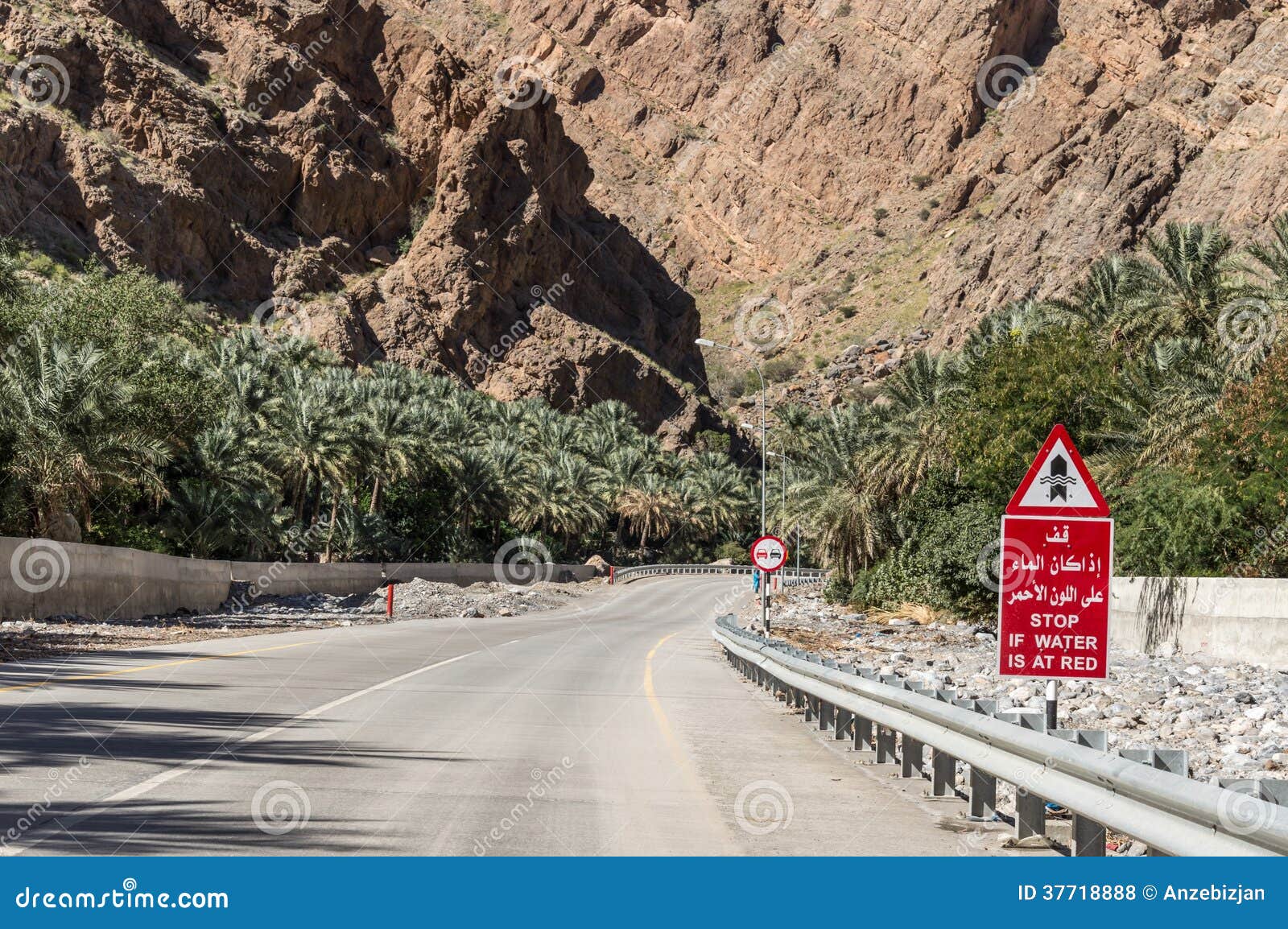 Traffic Sign Inffront of a Wadi Crossing Stock Photo - Image of sign ...