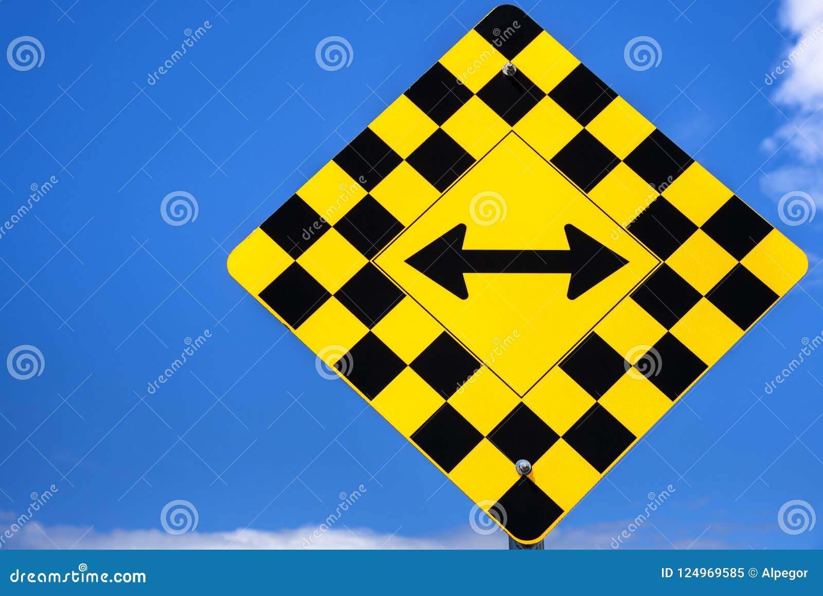 Traffic Sign at an Intersection and Blue Sky Stock Image - Image of ...
