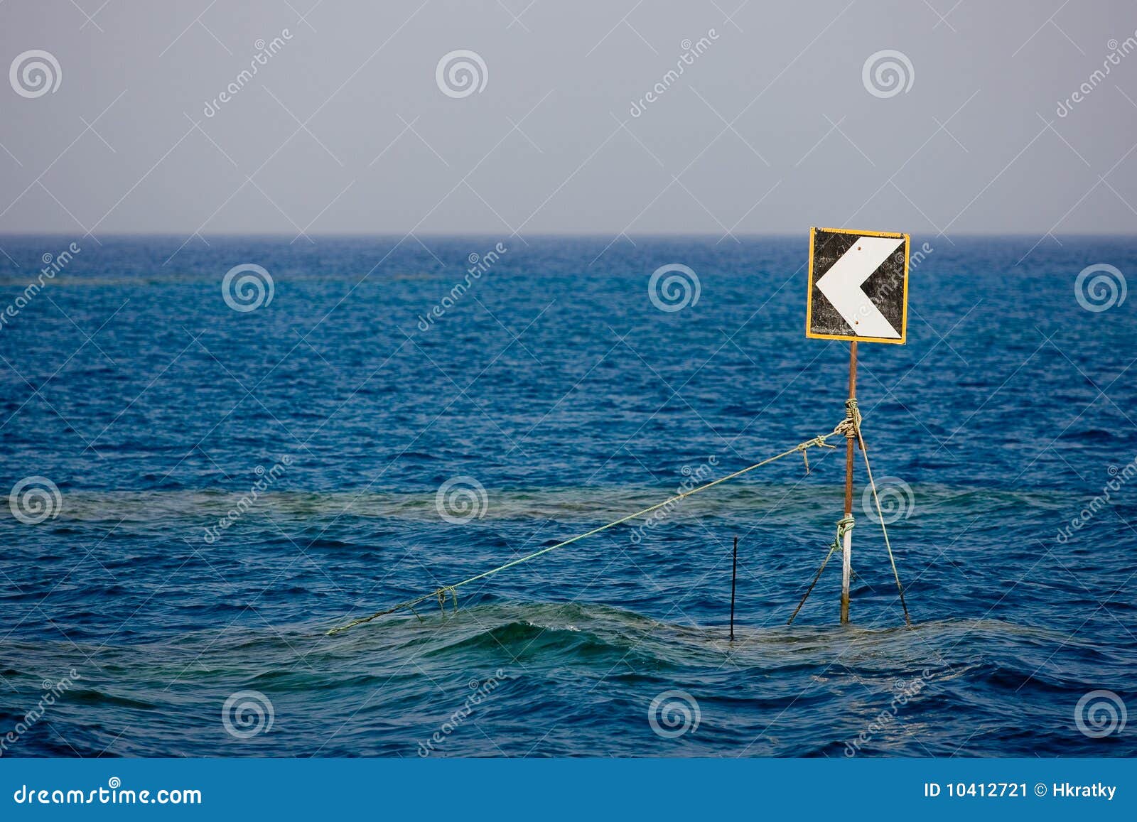 Traffic sign on the ocean. stock image. Image of white - 10412721