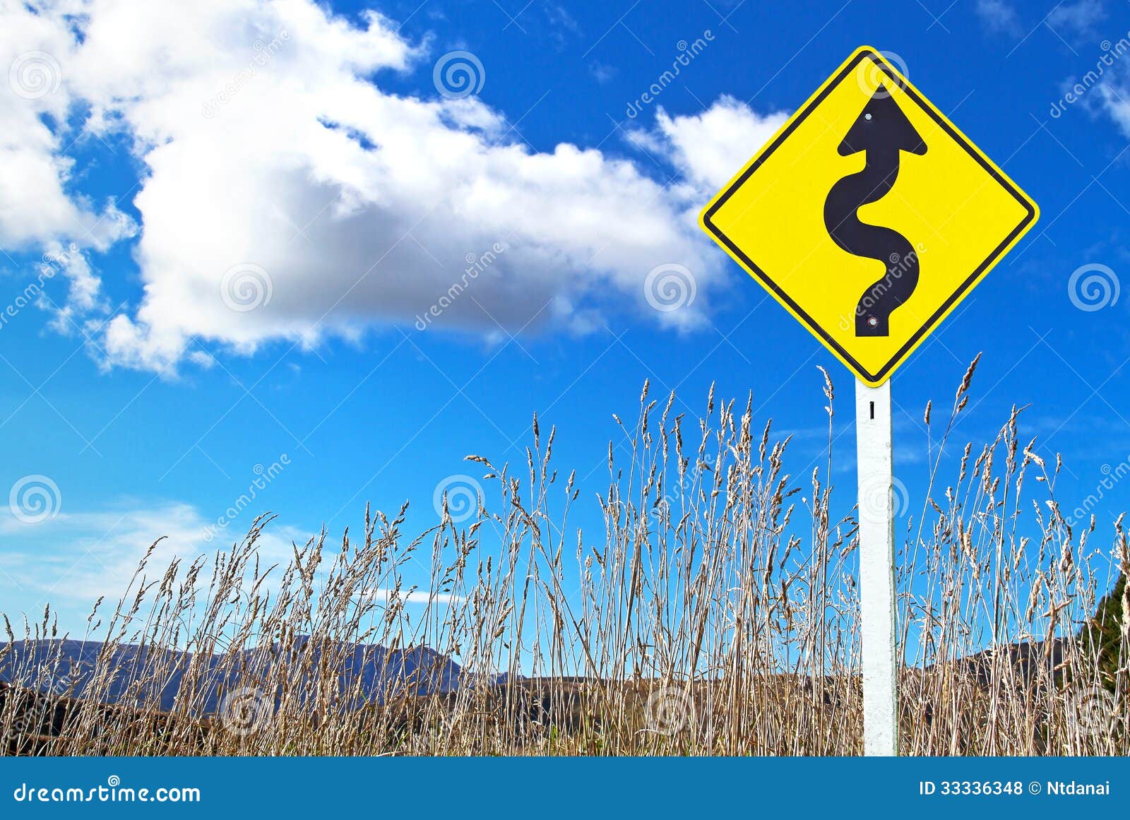 Traffic Sign Over Dry Grass Stock Photo - Image of season, safety: 33336348