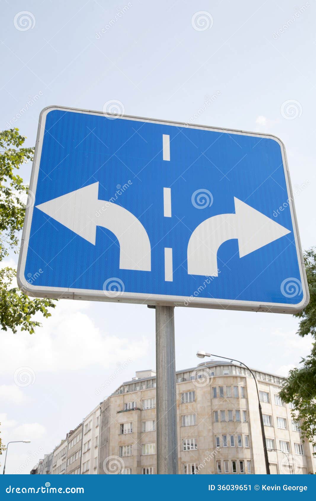 Traffic Sign in Urban Setting Stock Image - Image of left, arrow: 36039651