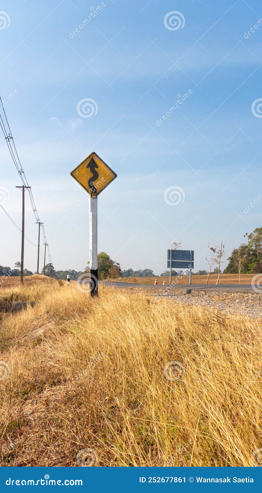 A Traffic Sign Warning of a Curve in the Countryside Stock Image ...