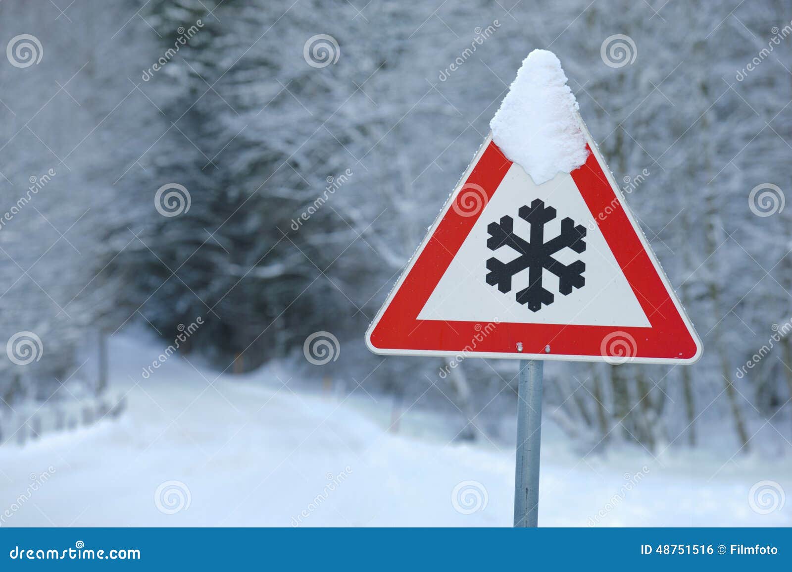 Traffic sign warns of snow stock photo. Image of traffic - 48751516