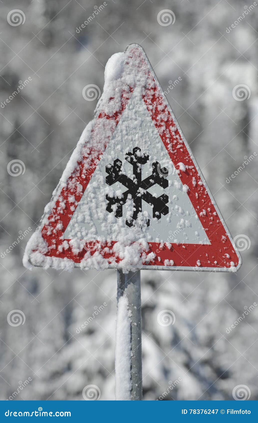 Traffic Sign Warns of Snow and Ice at Winter on Road Stock Image ...