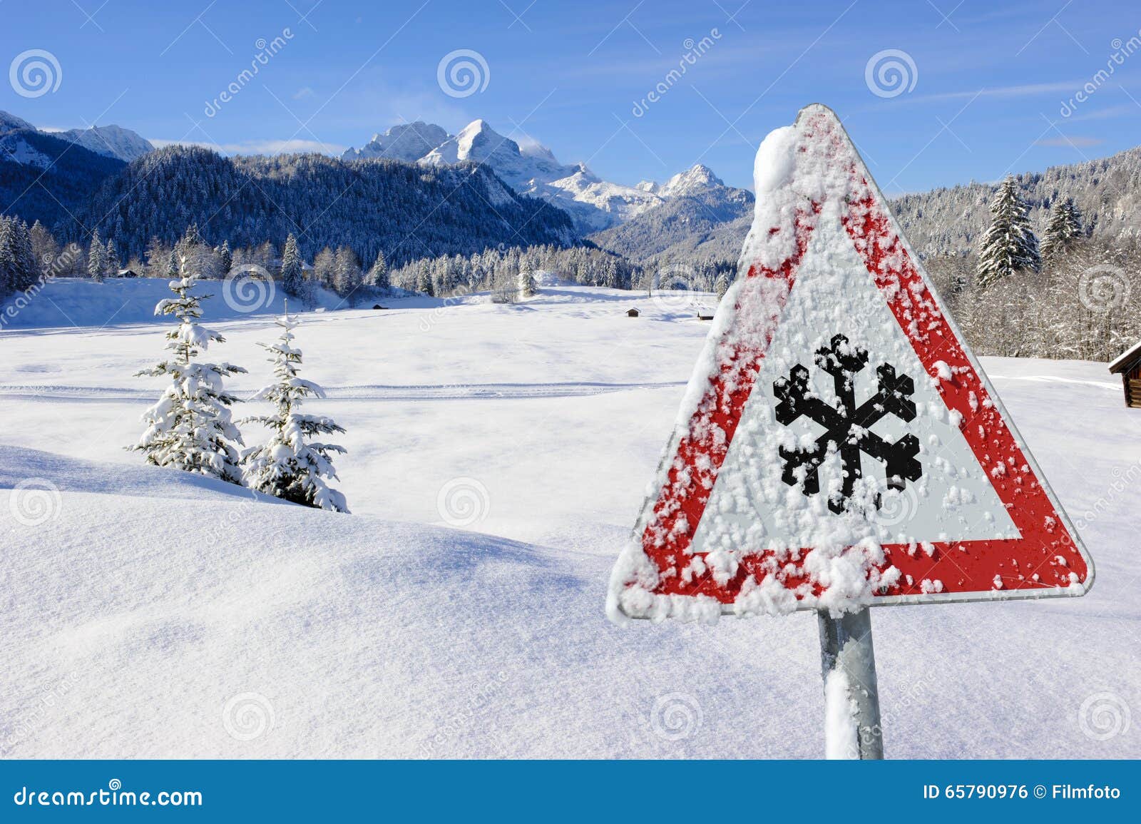 Traffic Sign Warns of Snow and Ice at Winter Stock Photo - Image of ...