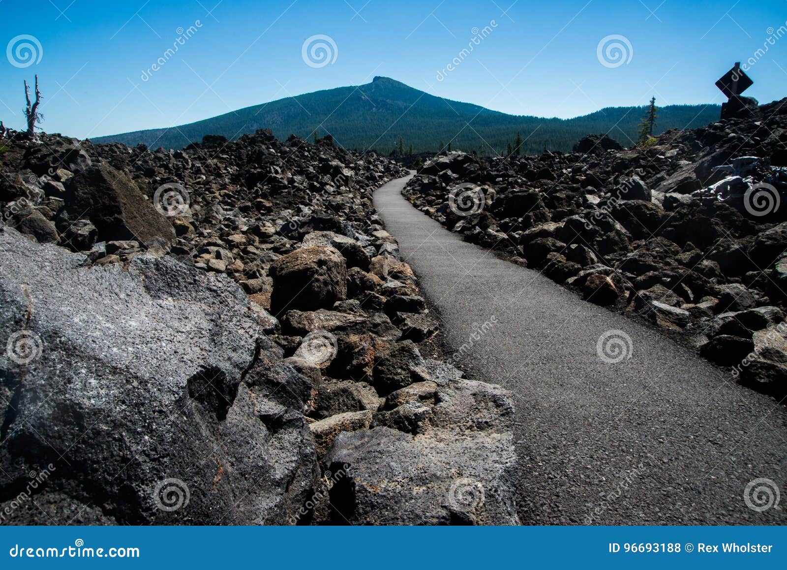Trail through lava fields stock photo. Image of cascade - 96693188