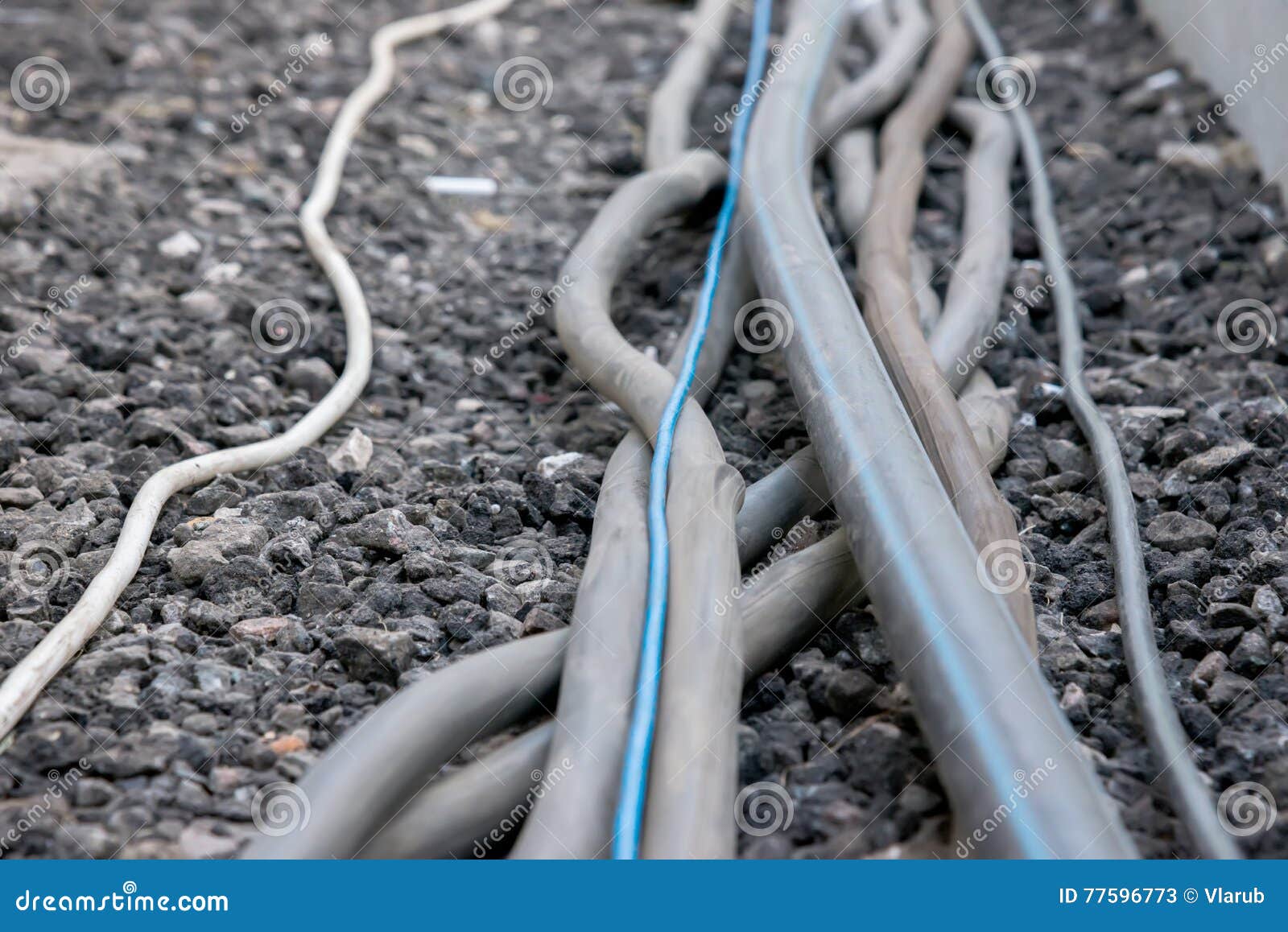 Trail of Power Electrical Cables on the Ground Stock Image - Image of ...