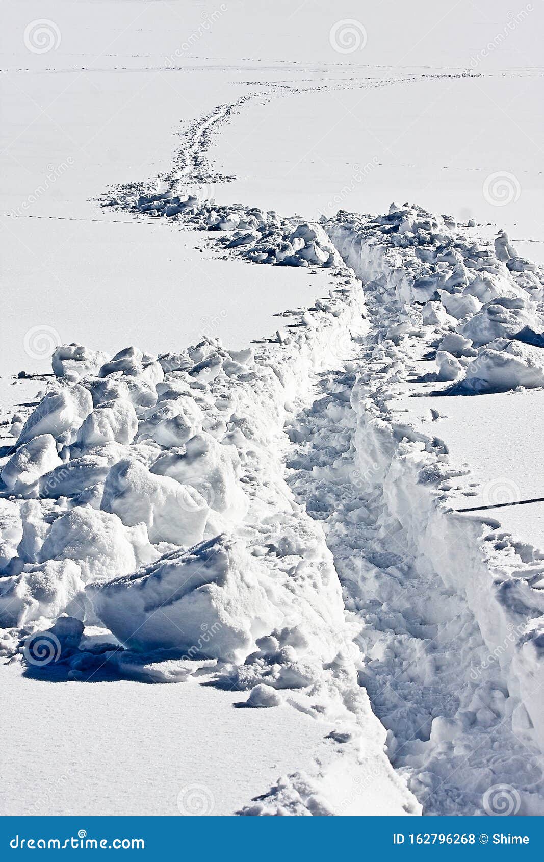 Trail in the snow stock photo. Image of mountains, lifestyles - 162796268