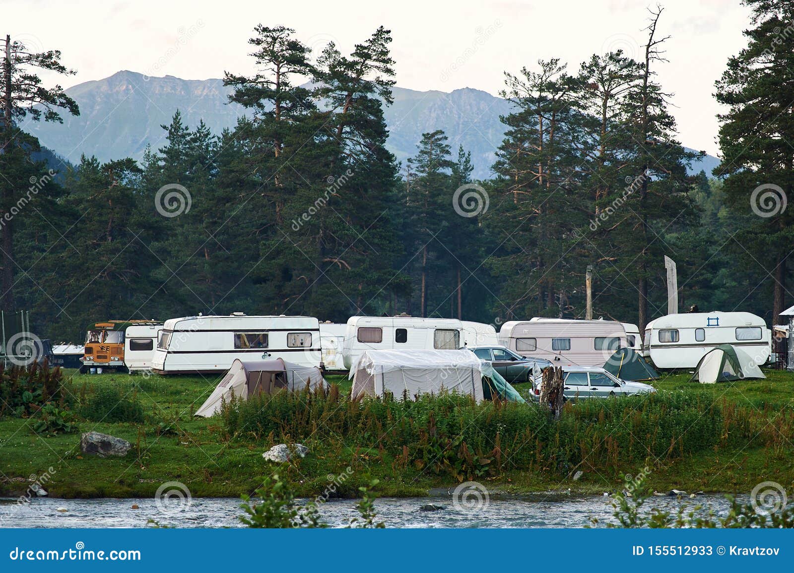 Trailer Camp at Green Valley in the Forest. Glade Full of Camper Vans ...