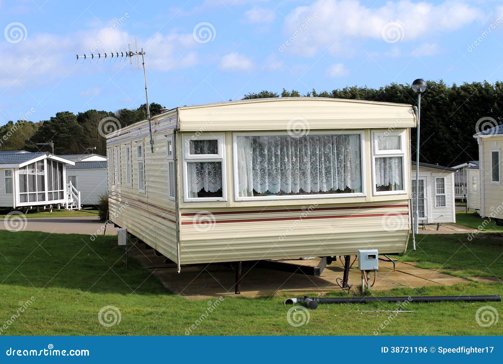 Trailer on Caravan Park in Summer Stock Photo - Image of trailer, green ...