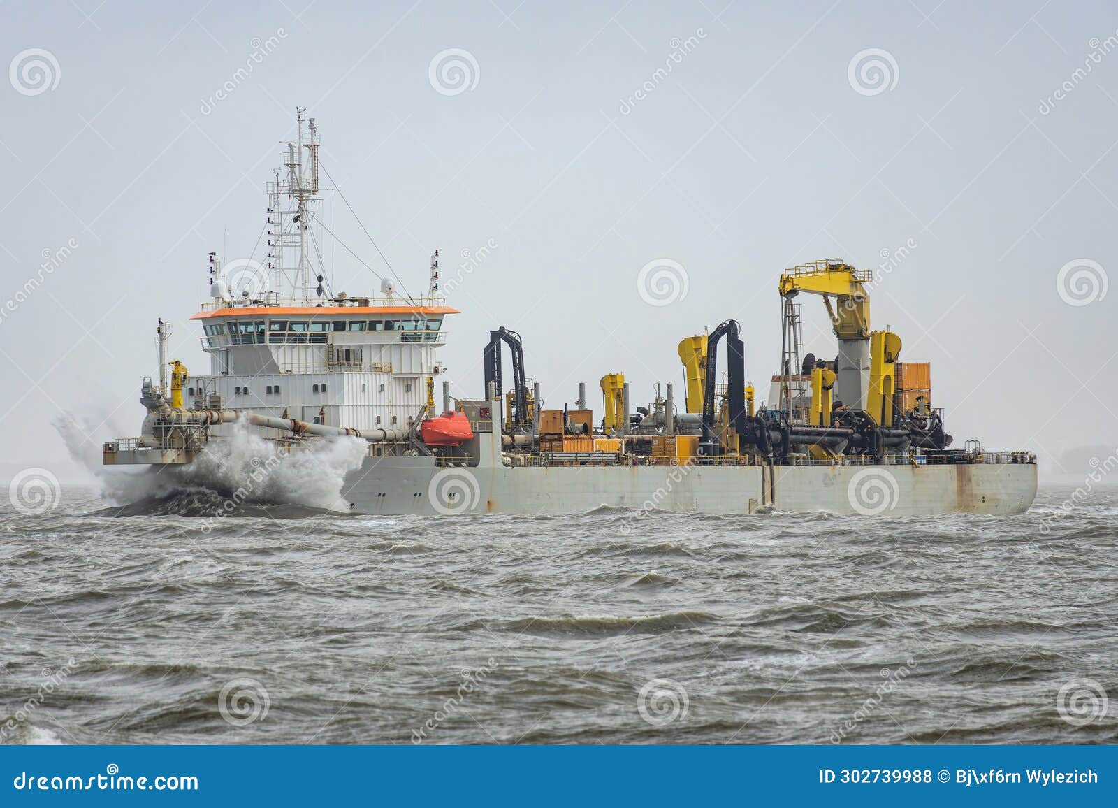 Trailing Suction Hopper Dredger Stock Photo - Image of vessel ...
